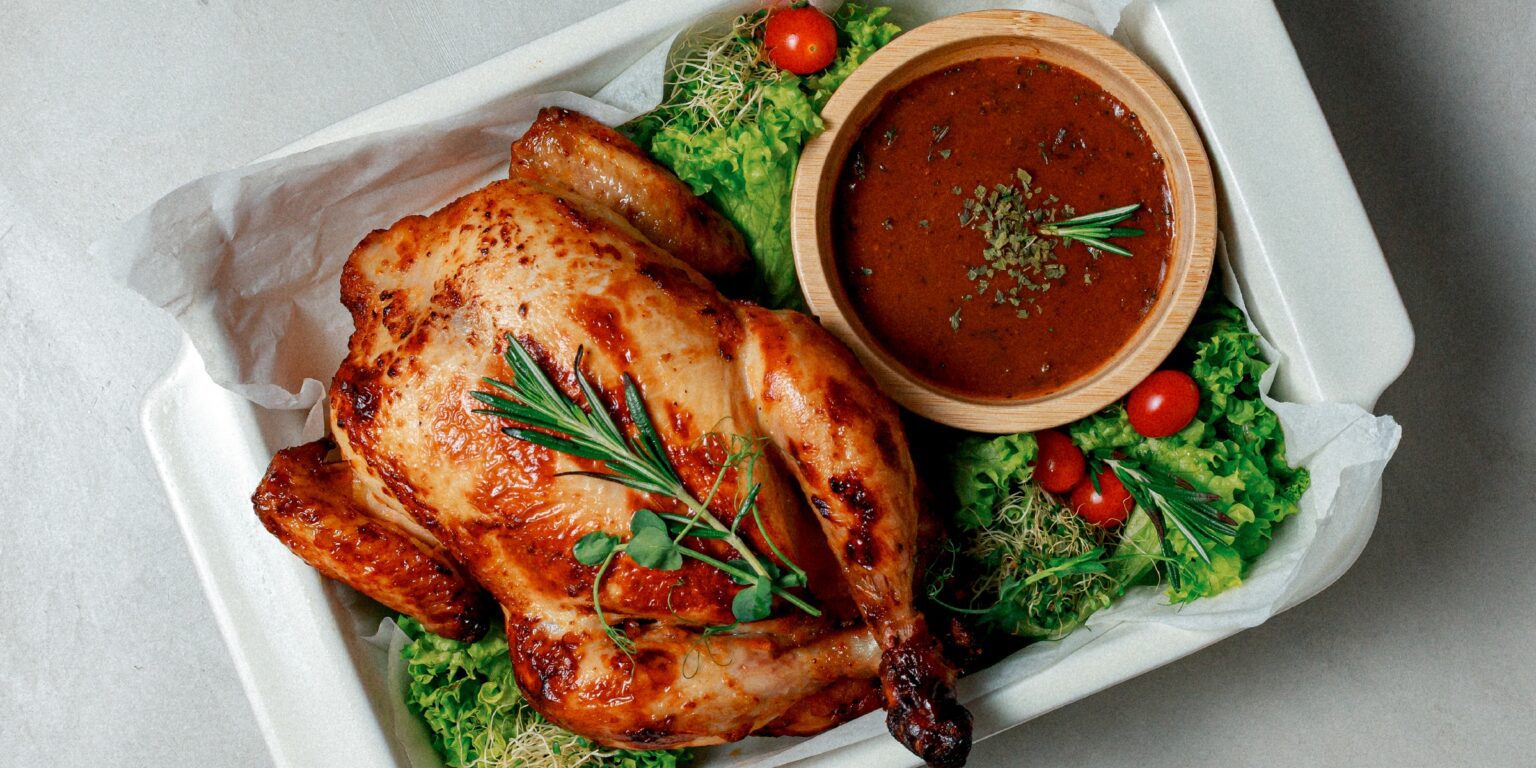 Roasted Peach-Stuffed Whole Chicken - Four Seasons Catering